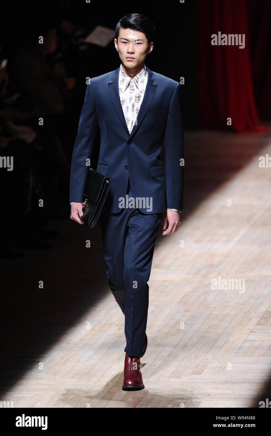 A model displays a new creation by Chinese fashion designer Wang Yutao in the AsahiKASEI fashion ...