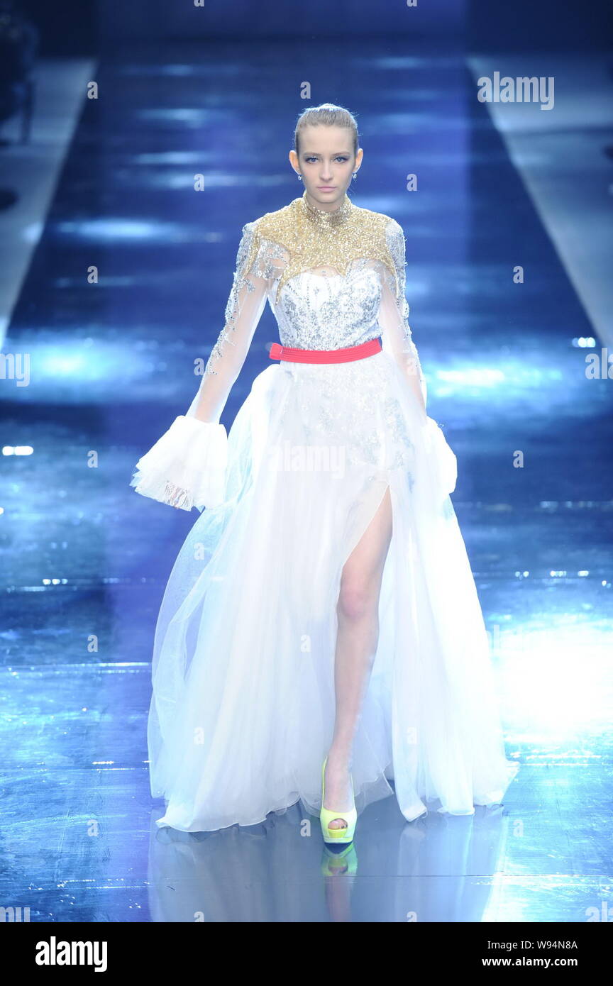 A model displays a new creation by Chinese fashion designer Mark Cheung ...