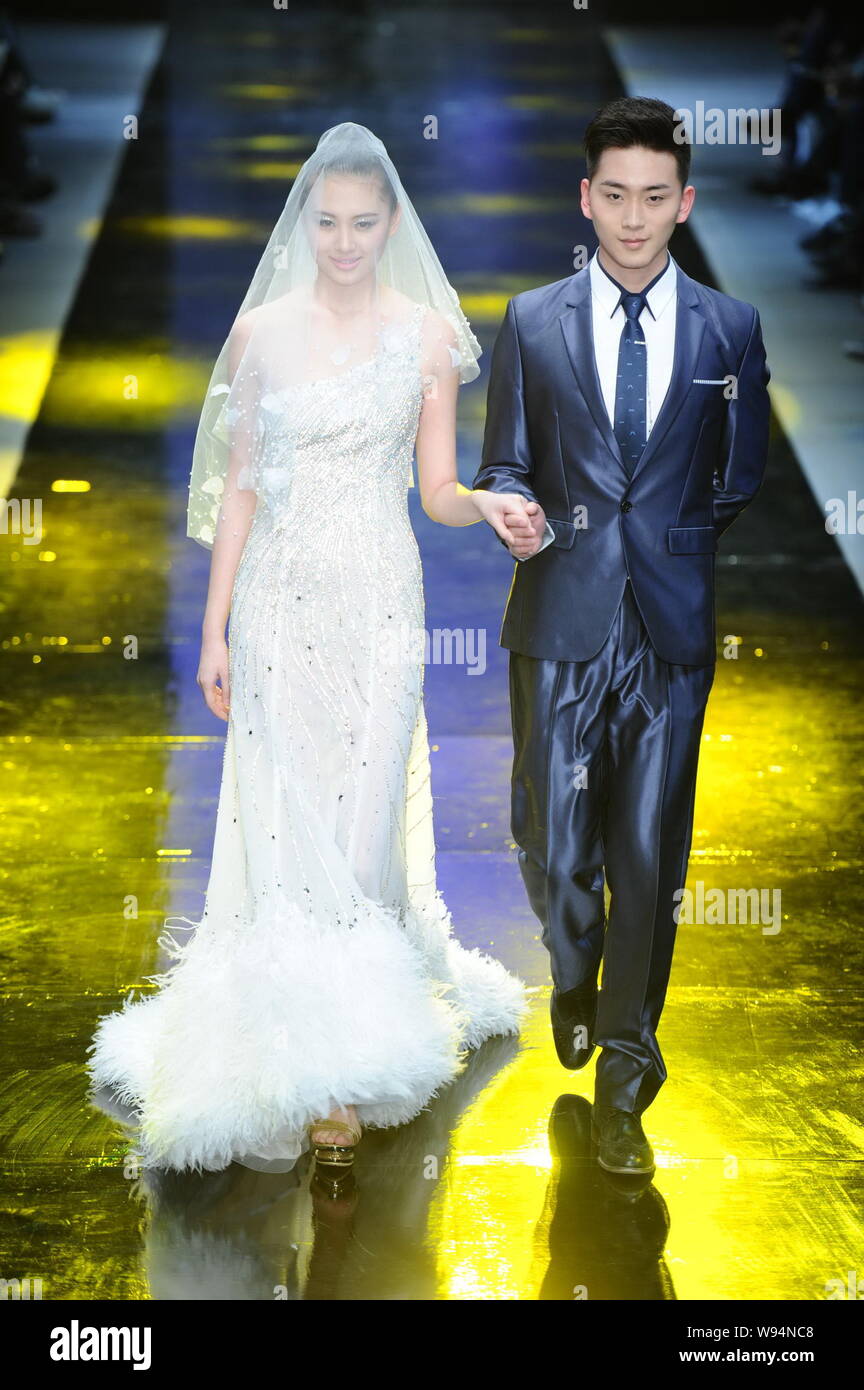 Models display new creations by Chinese fashion designer Mark Cheung in the Mark Alpha Oerma ...