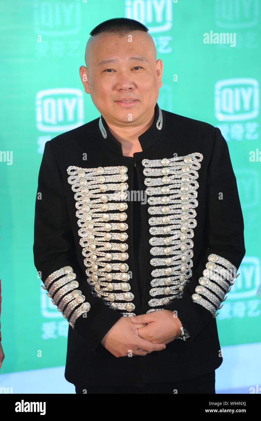 Chinese crosstalk comedian Guo Degang poses on the red carpet as he ...