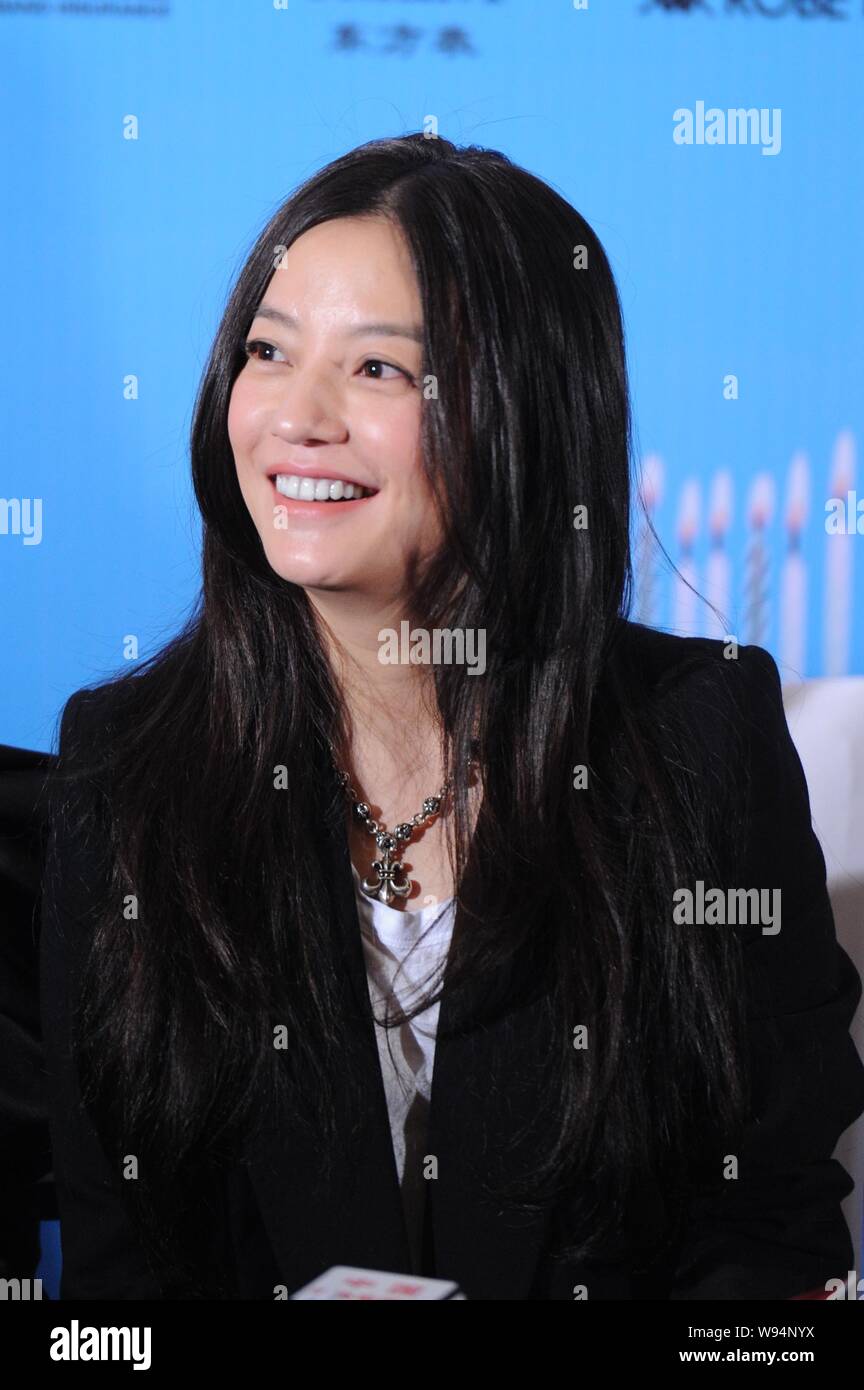 Chinese actress and director Zhao Wei, smiles at a press conference of ...