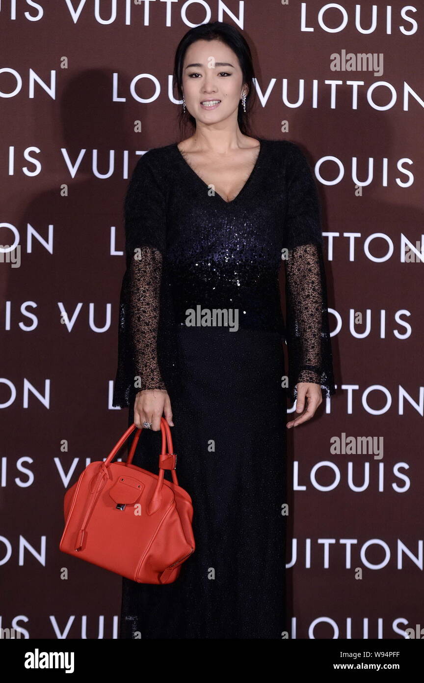 Chinese actress Gong Li poses during the opening ceremony for the new ...