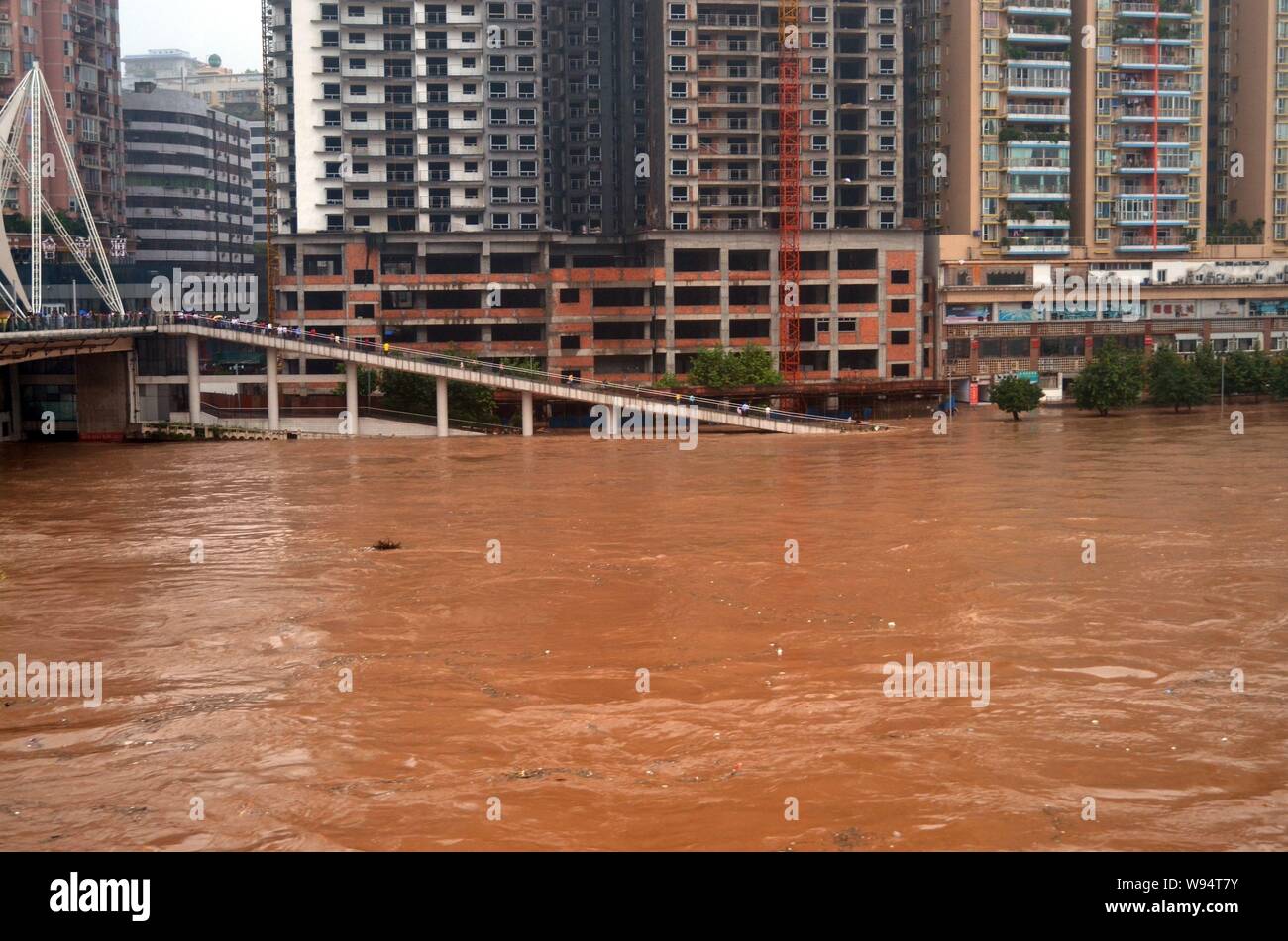 Buildings are inundated by flood after days of torrential rain in ...