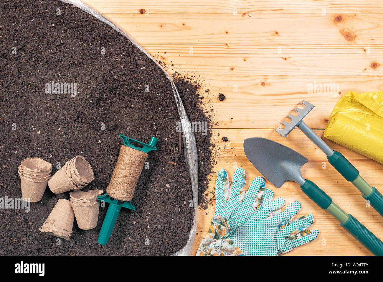 Gardening equipment, top view of tools and potting soil Stock Photo - Alamy
