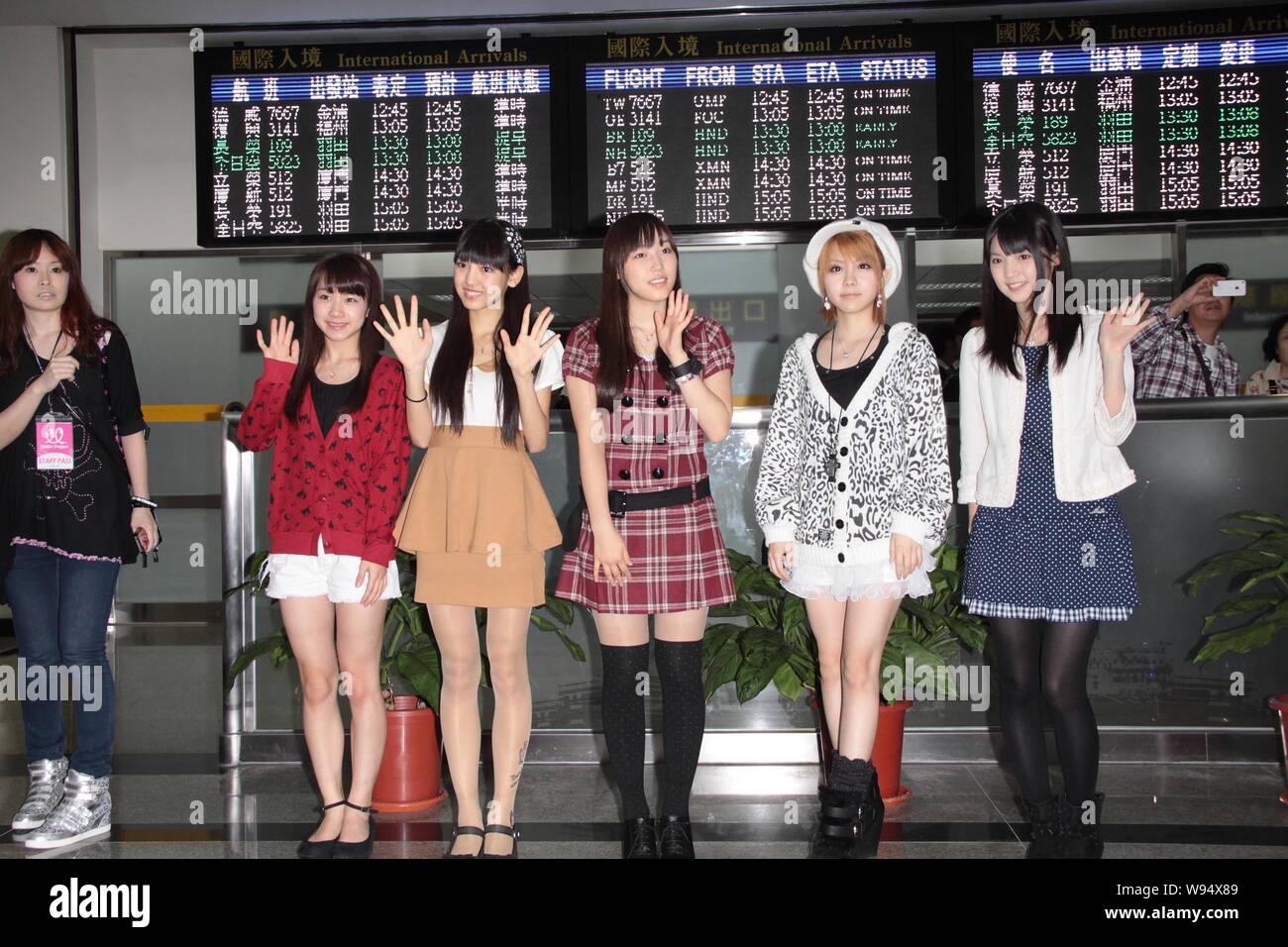 Members of Japanese pop idol girl group Morning Musume arrive at Taipei ...