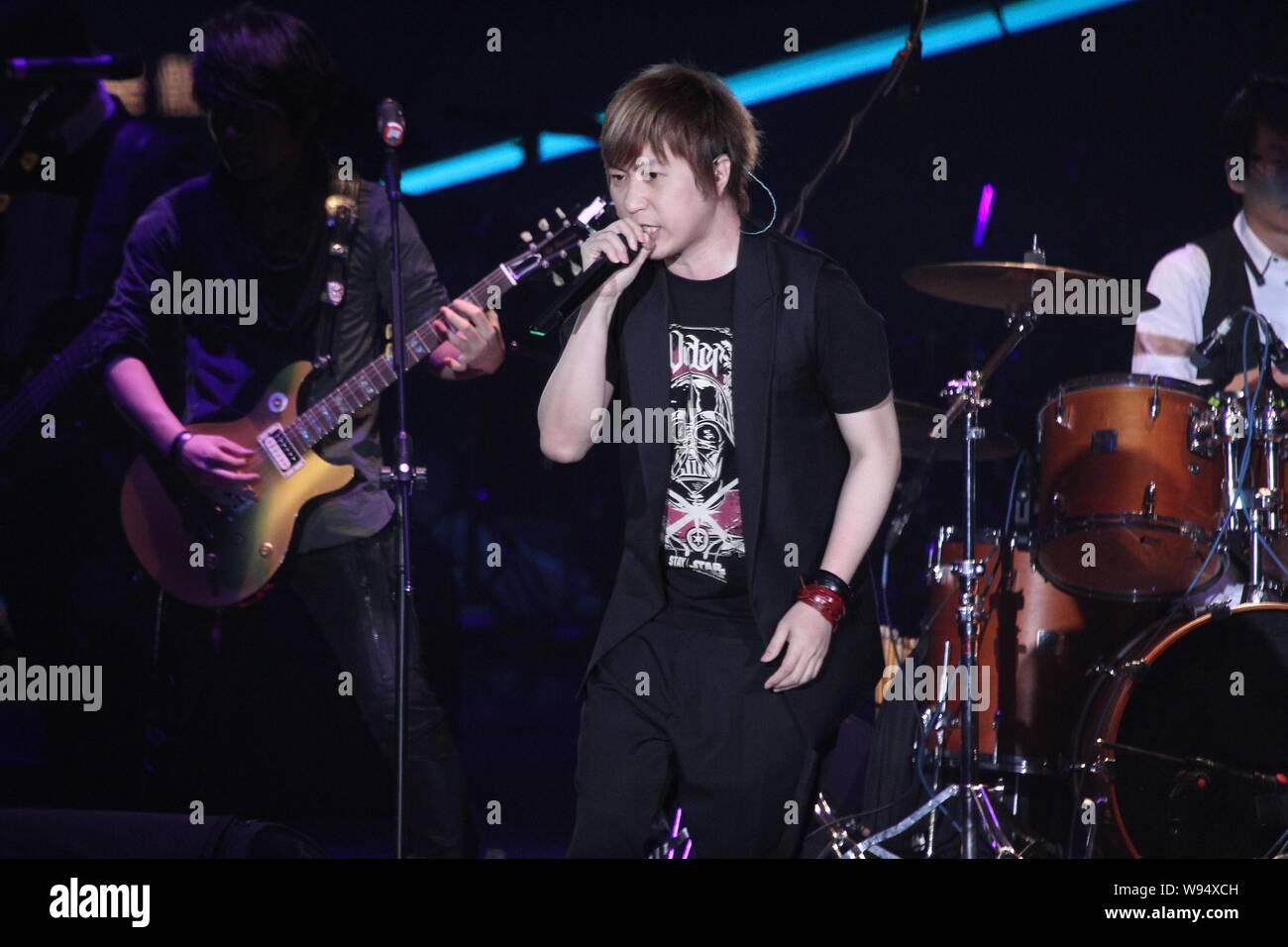 Chen Hsin-hung, center, better known by his stage name Ashin, and other ...