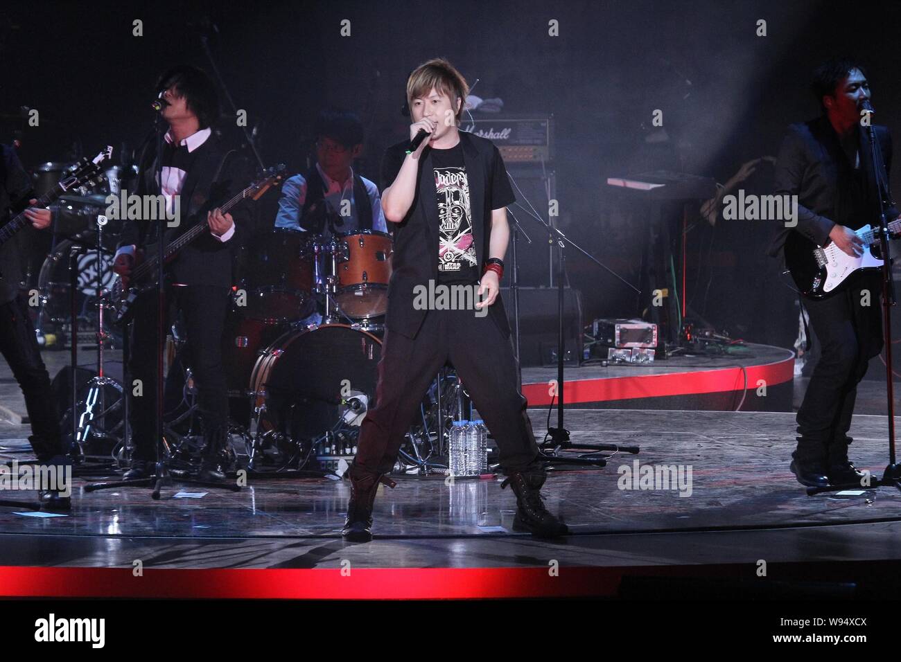 Chen Hsin-hung, center, better known by his stage name Ashin, and other ...