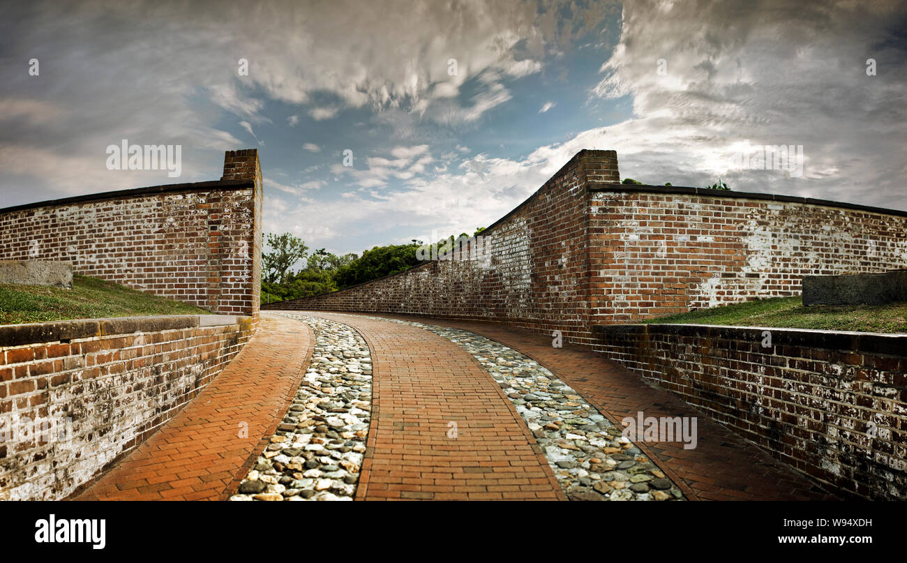 Brick driveway with storm clouds in sky Stock Photo - Alamy