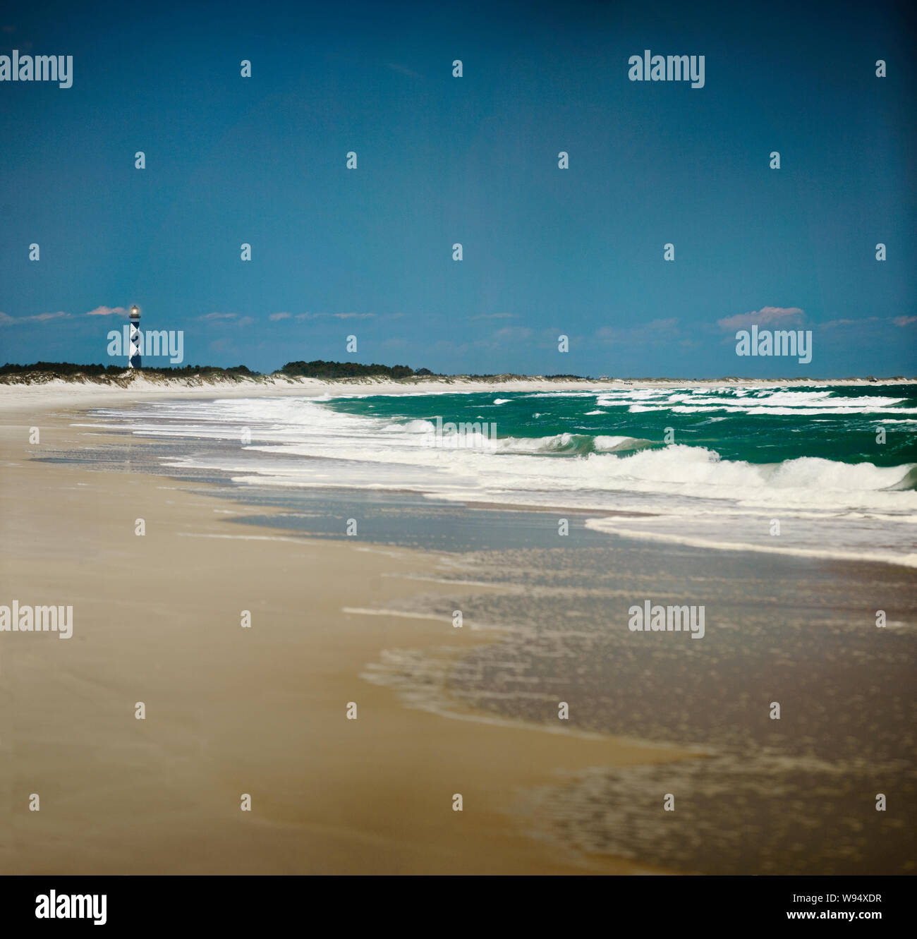 Lighthouse on the beach Stock Photo - Alamy