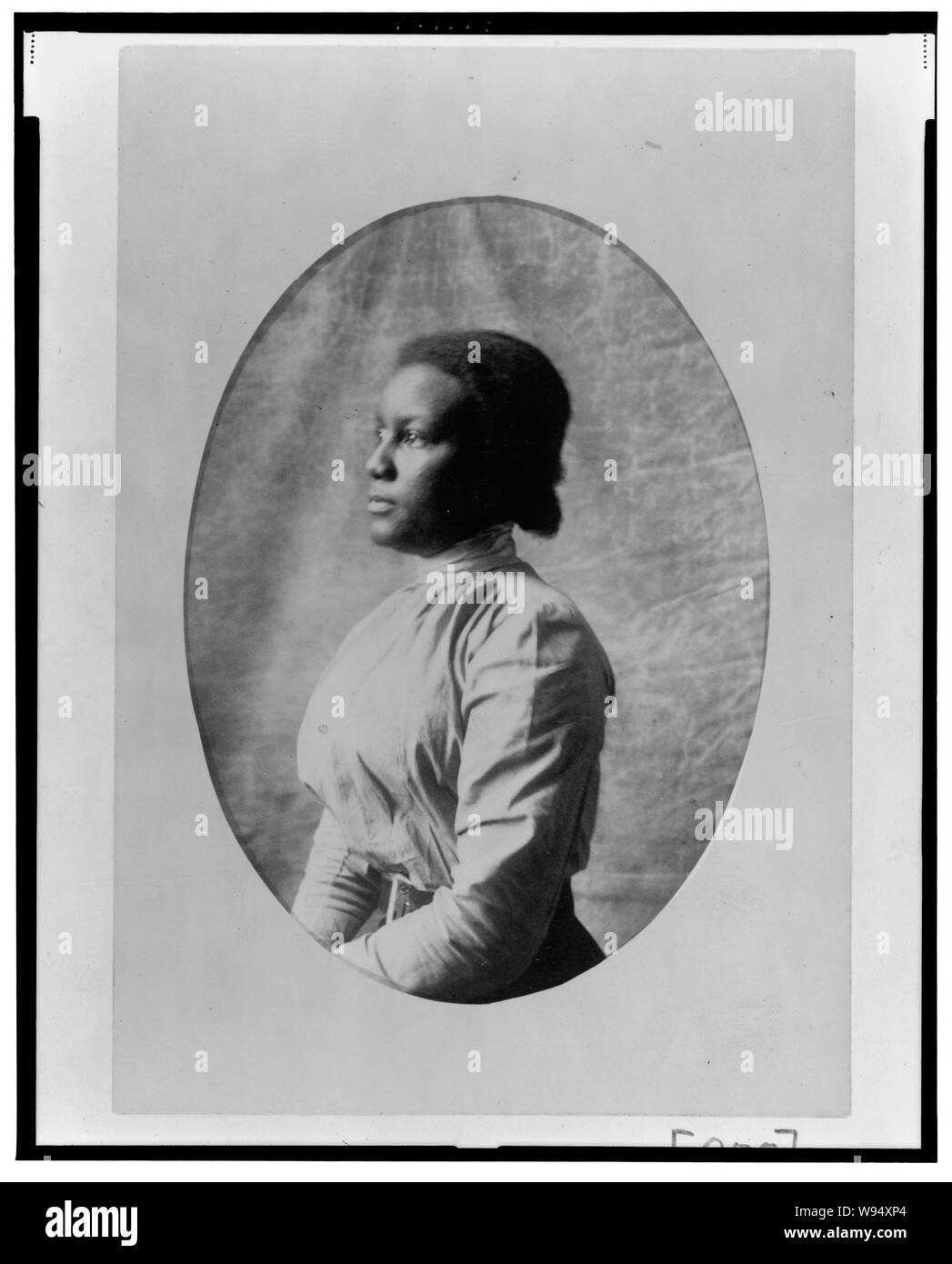 African American woman, half-length portrait, left profile Stock Photo ...