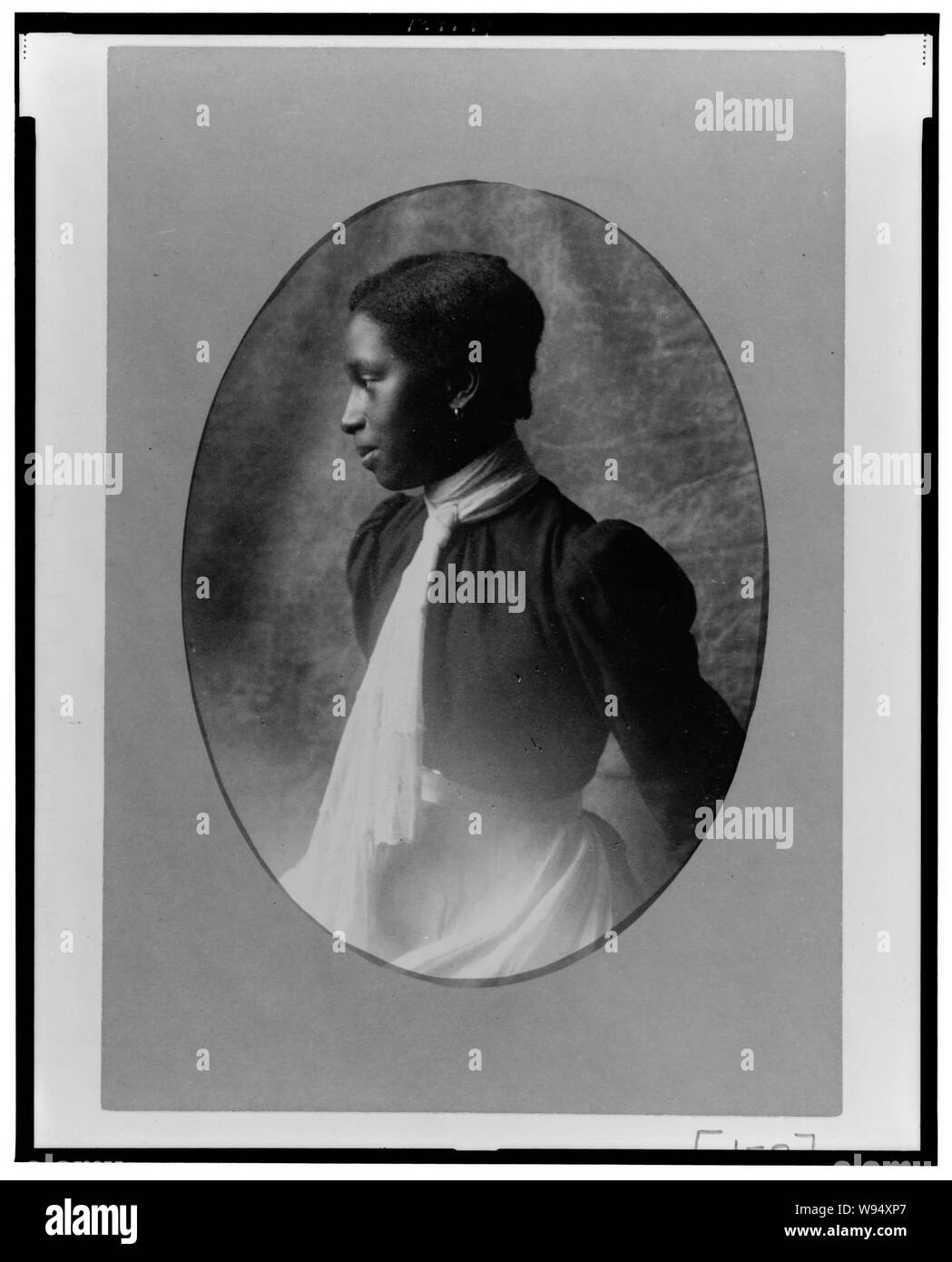 African American woman, half-length portrait, left profile Stock Photo ...