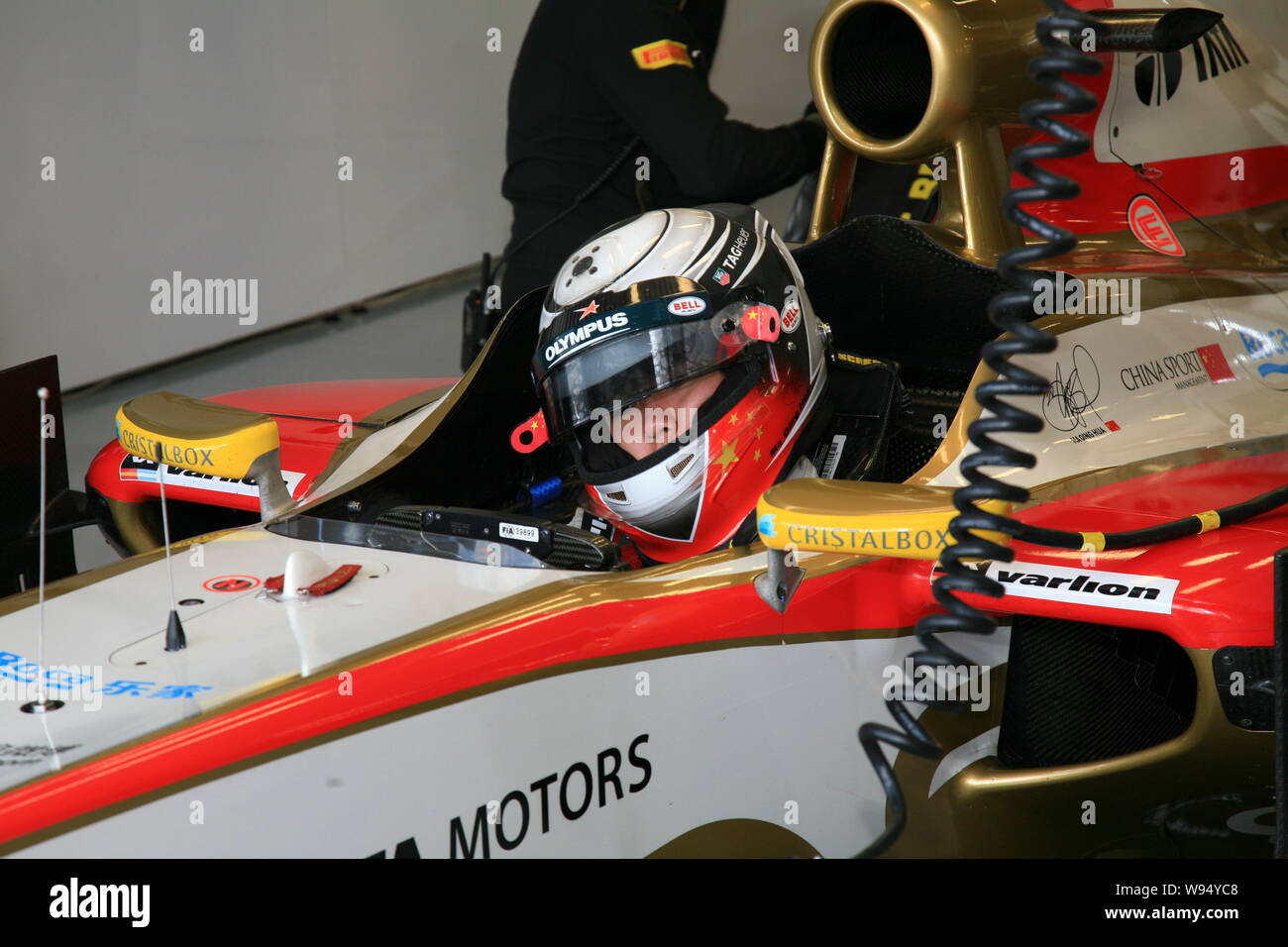 Chinese F1 driver Ma Qing Hua (or Ma Qinghua) of HRT Formula One Team ...