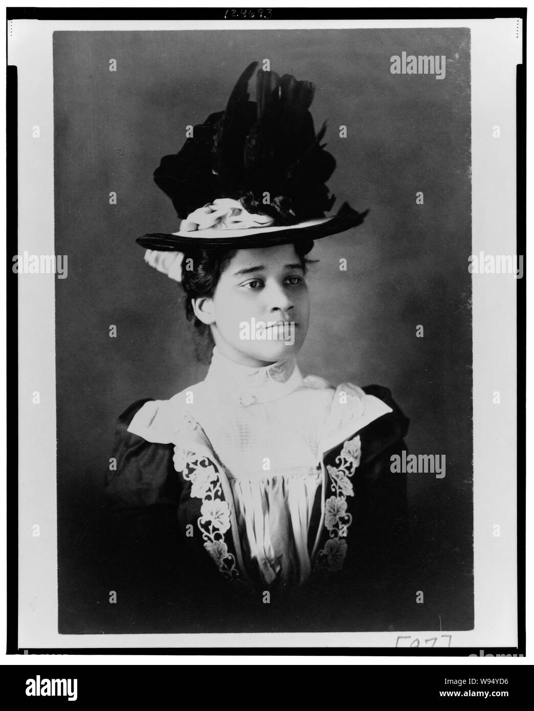 African American woman, head-and-shoulders portrait, wearing hat ...
