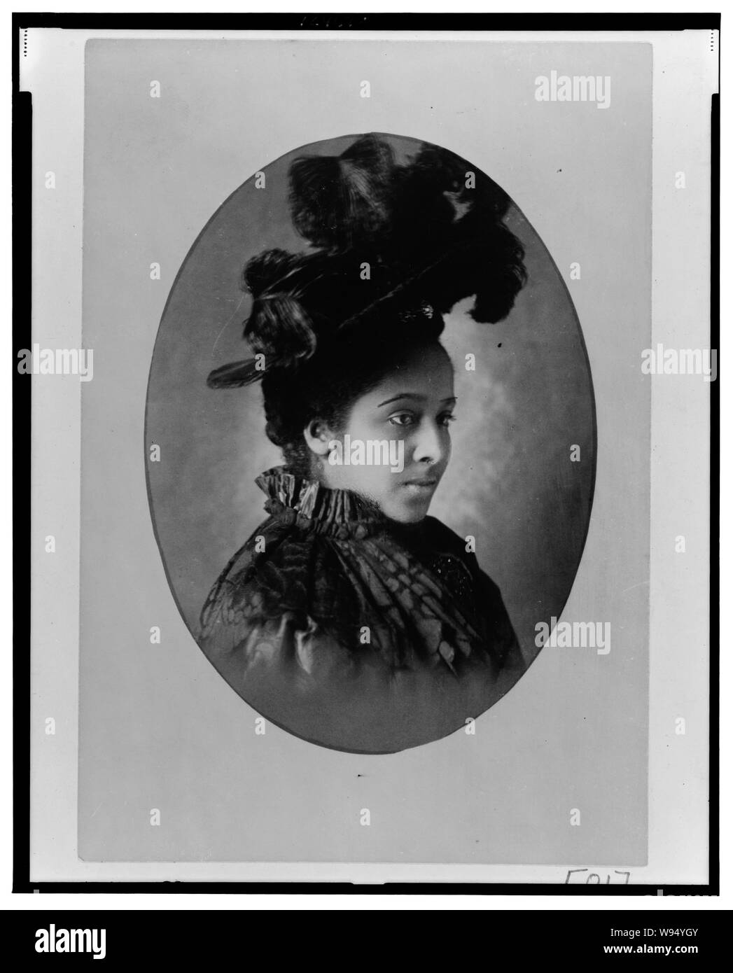 African American woman, head-and-shoulders portrait, wearing hat ...