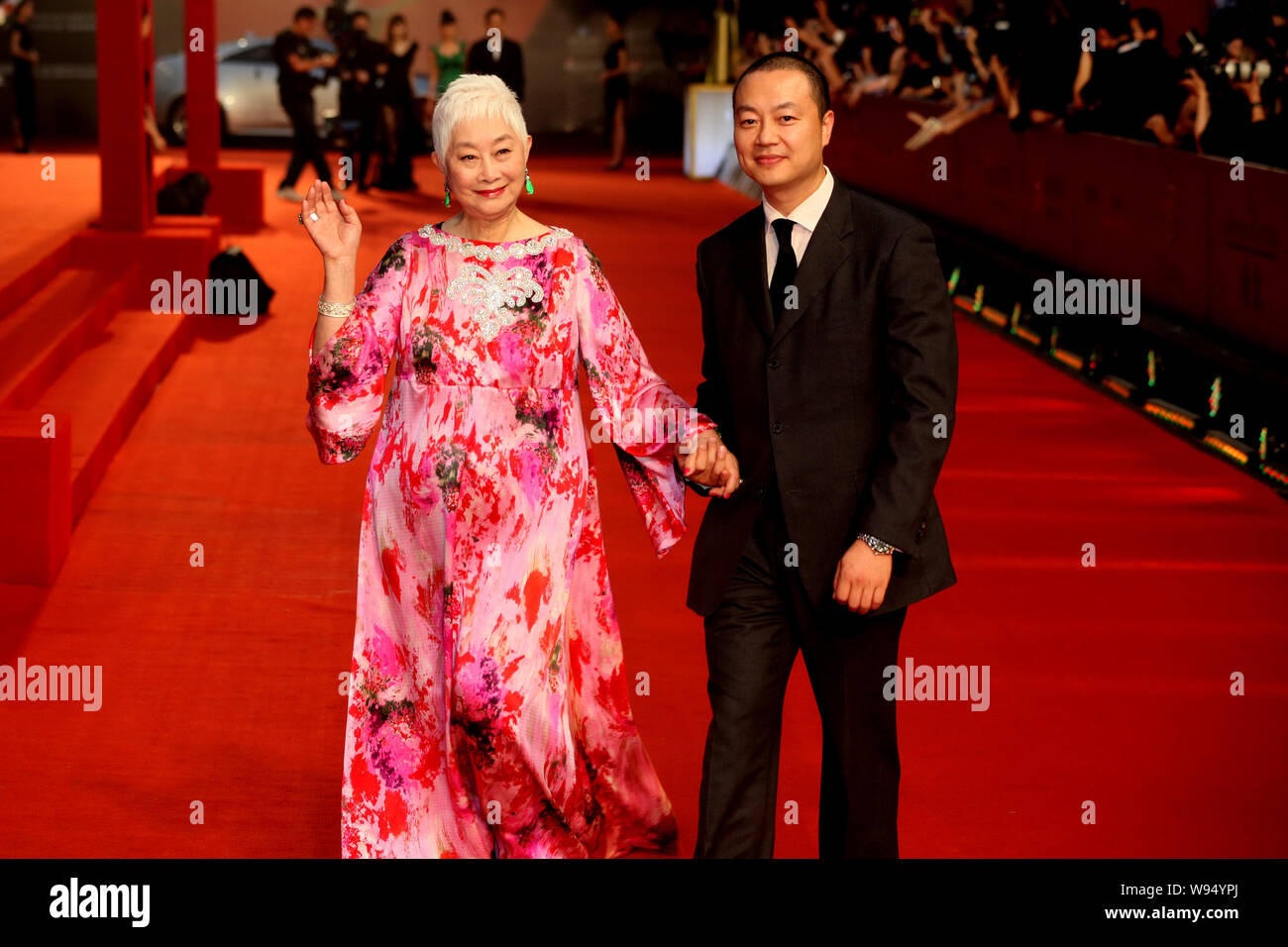 Chinese actress Lu Yan (L) poses on the red carpet prior to the closing ...