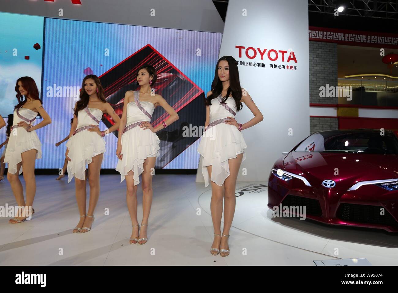 --File--Models pose at the stand of Toyota during an auto show in ...