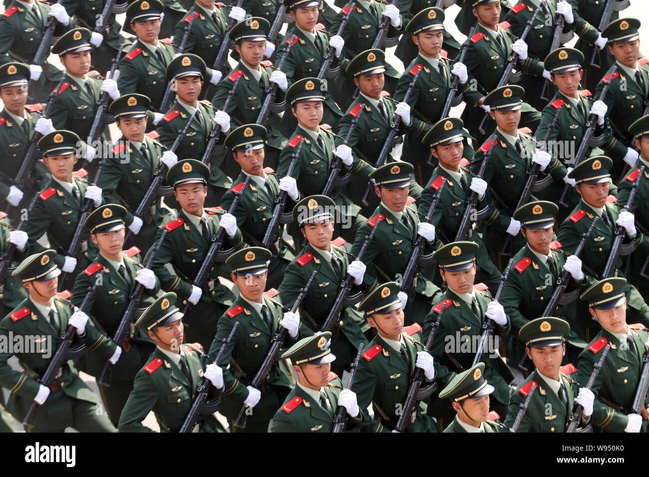 New recruits of the Chinese Peoples Armed Police Force parade during a ...