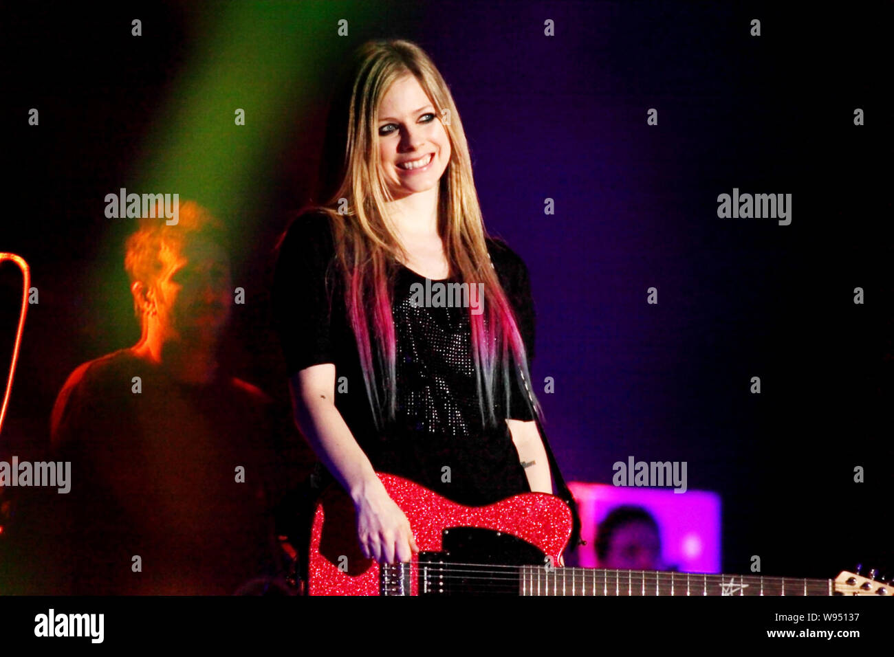Canadian singer Avril Lavigne performs at a concert during her world ...
