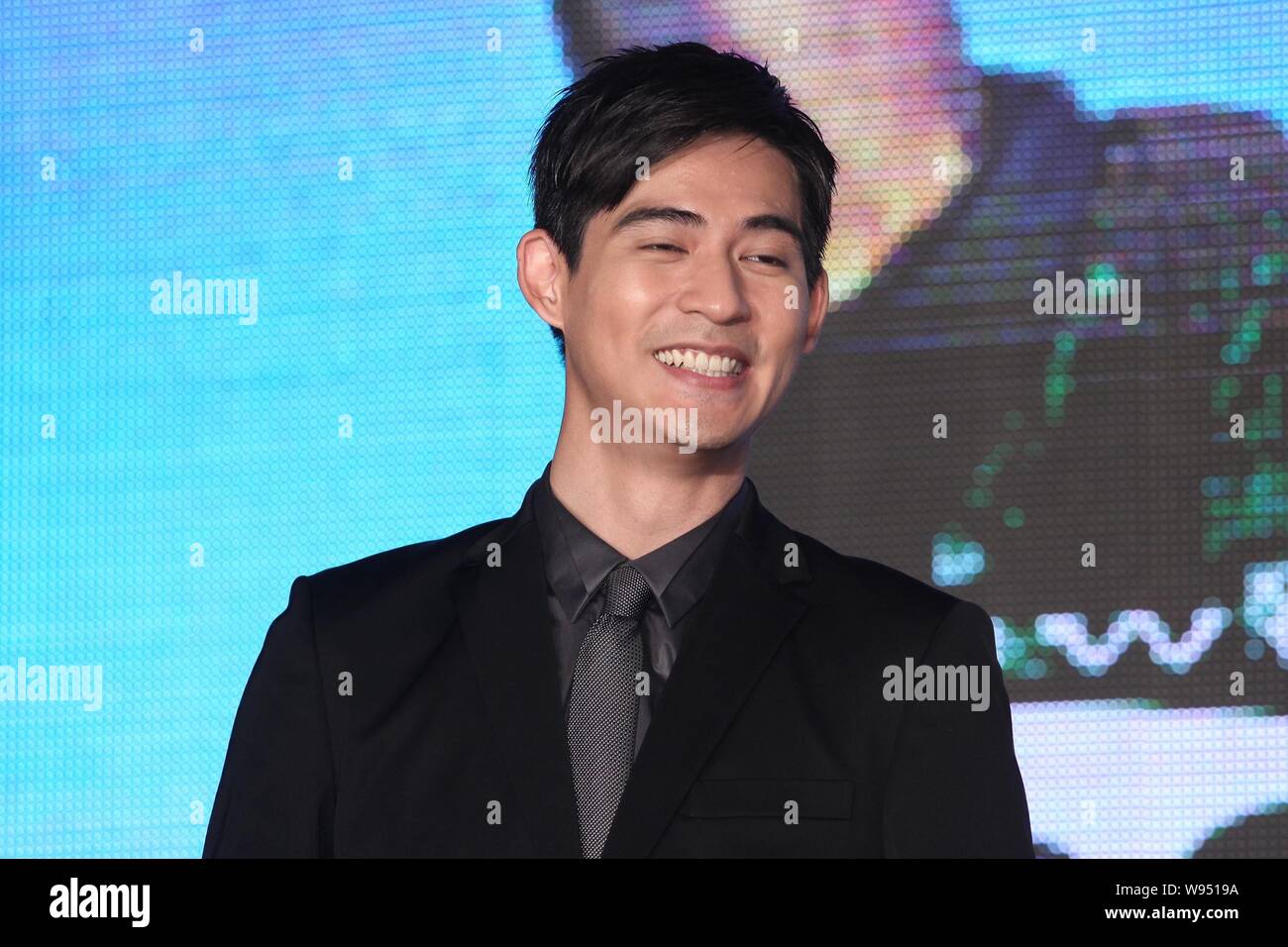 Taiwanese actor and singer Vic Chou grins during a premiere ceremony ...