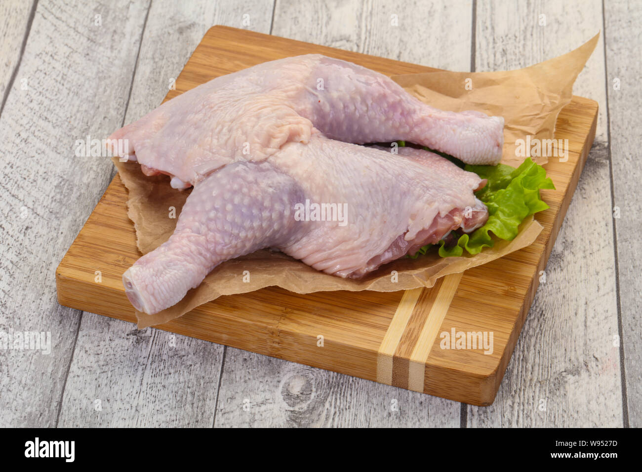 Raw chicken leg ready for cooking Stock Photo - Alamy