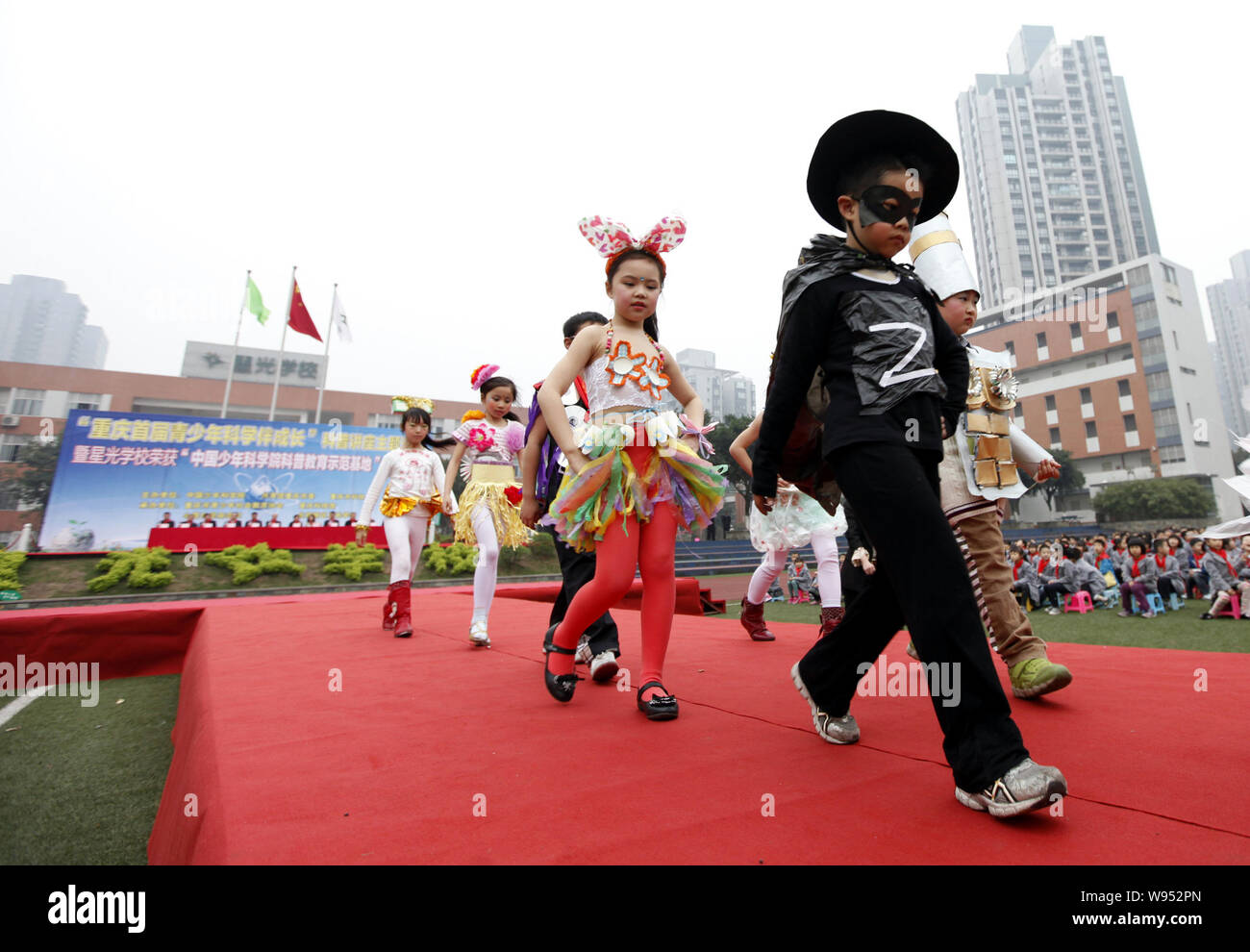 Young Chinese students parade to show new creations made with recycled ...