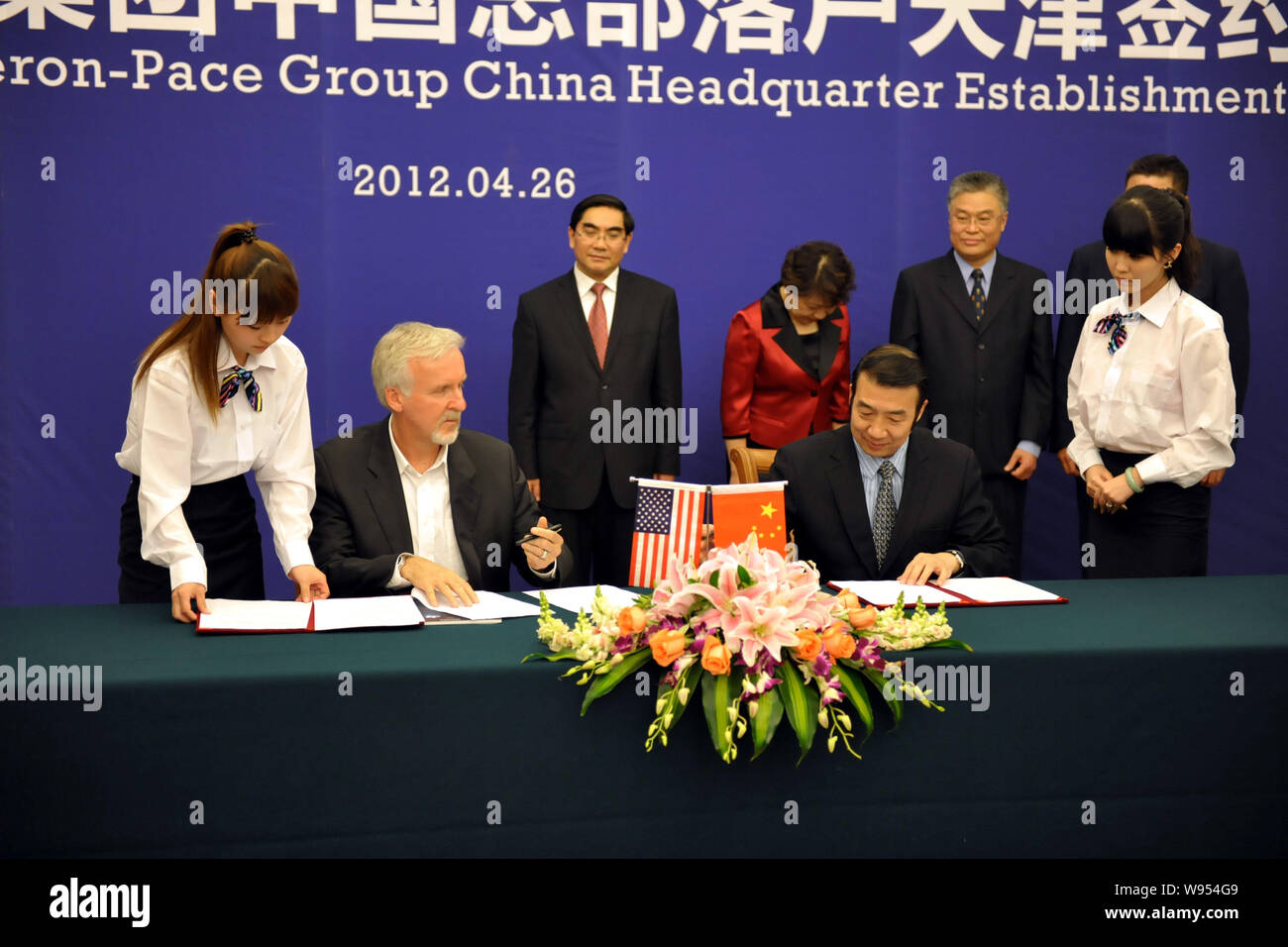 Canadian film director and producer James Cameron, second left, and ...