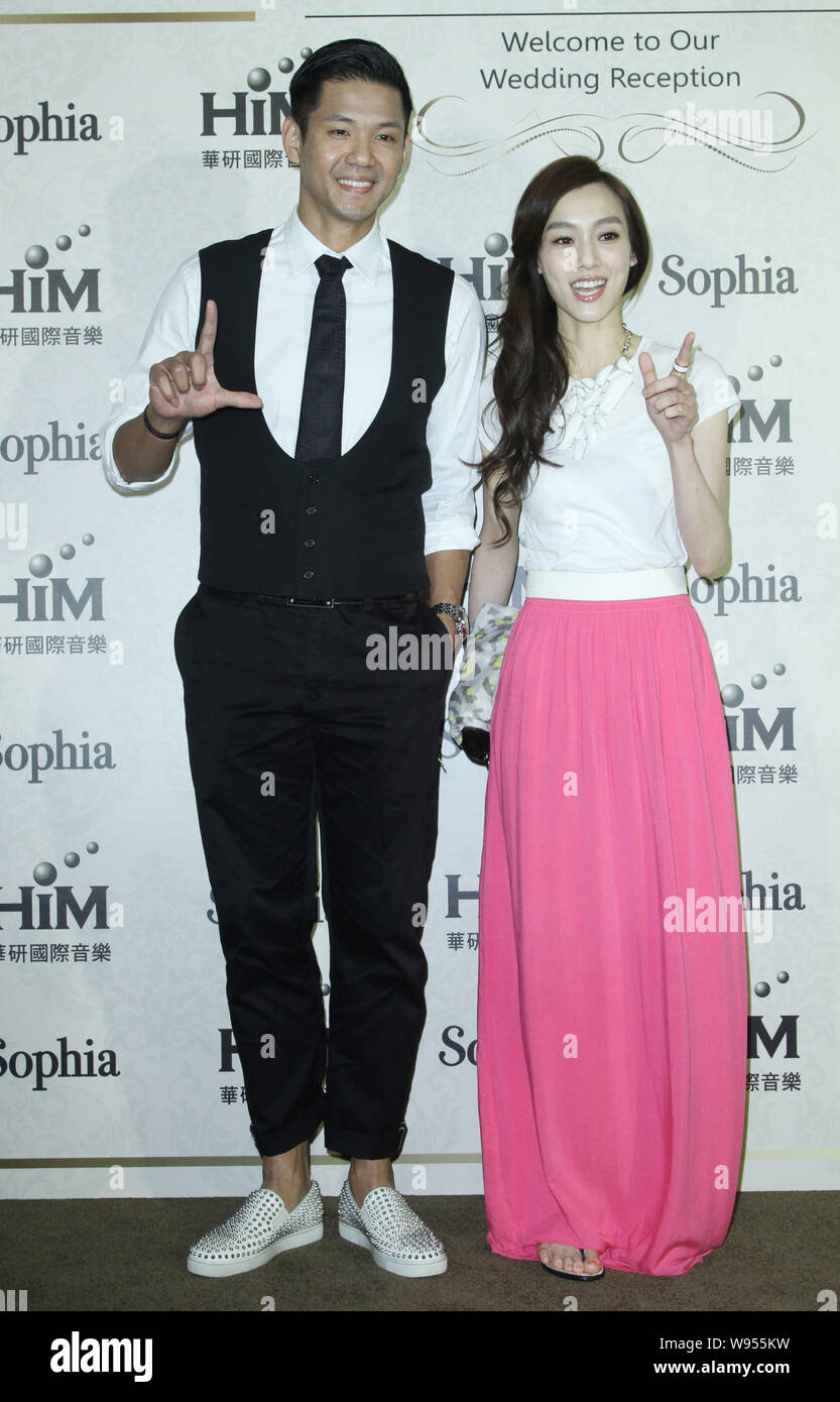 Taiwanese singer Fan Fan and her husband Blackie Chen pose during a ...