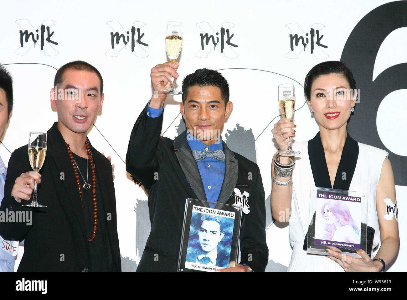 Hong Kong actress Michelle Monique Reis (R) and actor Aaron Kwok (C ...