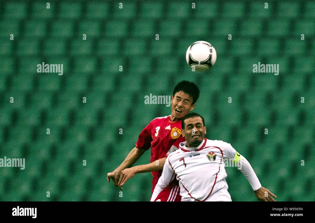 Sun Xiang of China, top, challenges Amer Deeb Mohammad Khalil of Jordan ...