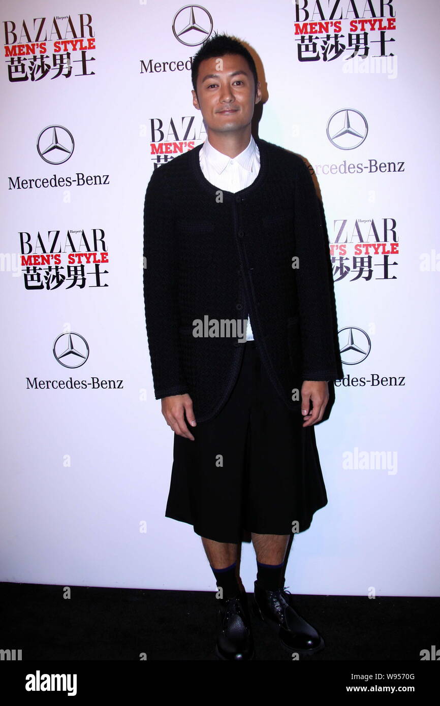 Hong Kong singer and actor Shawn Yue poses as he arrives for the award ...