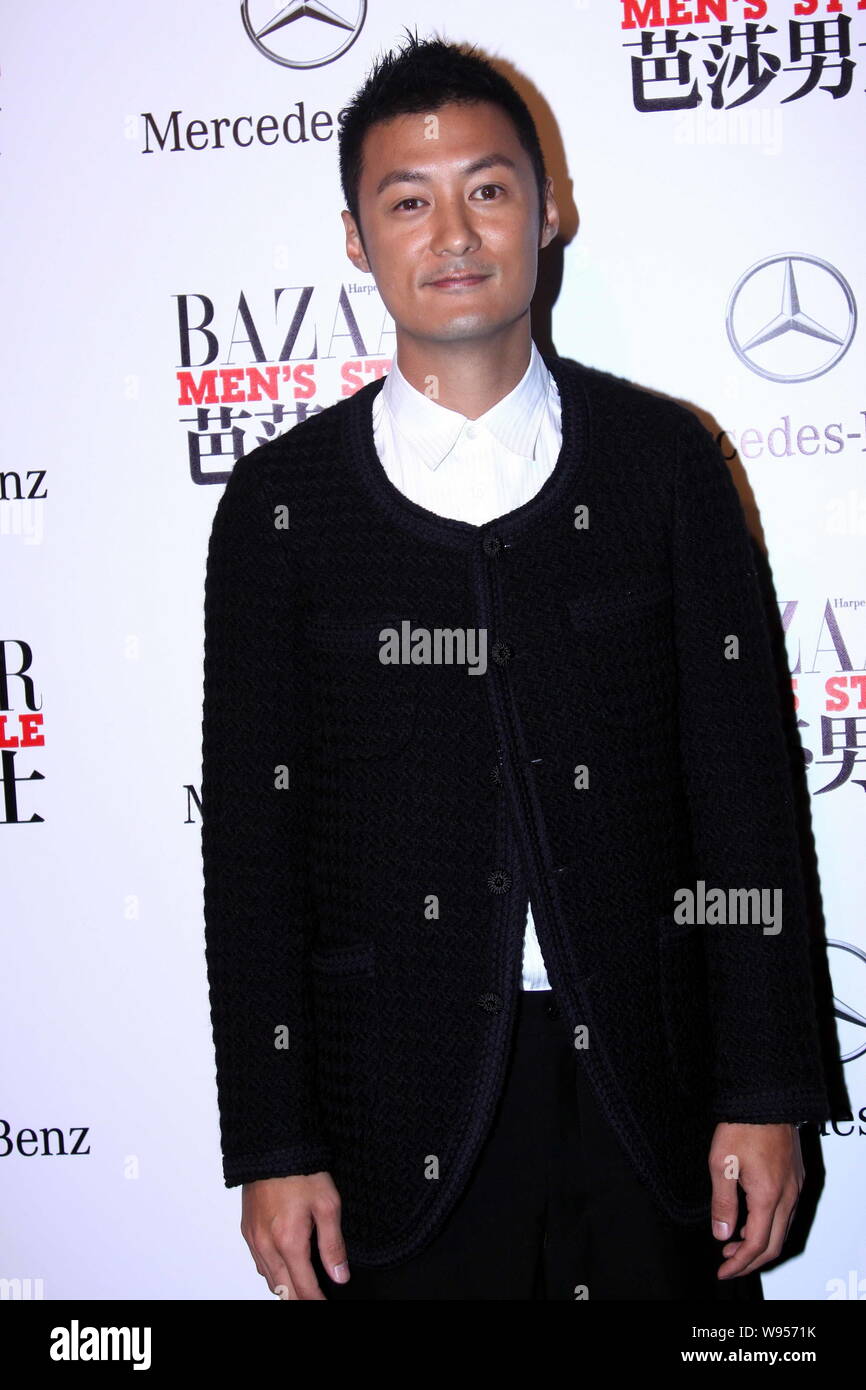 Hong Kong singer and actor Shawn Yue poses as he arrives for the award ...