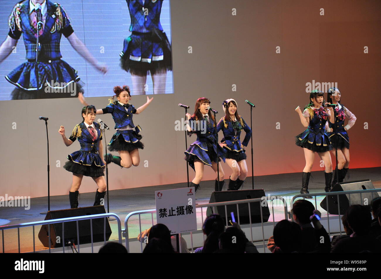 Members of Japanese female idol group AKB48 perform at their concert in ...