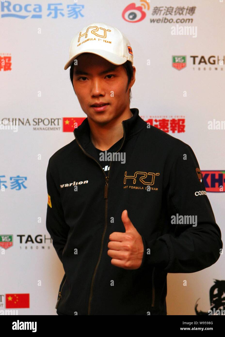 Chinese F1 driver Ma Qinghua poses at a press conference of HRT in ...