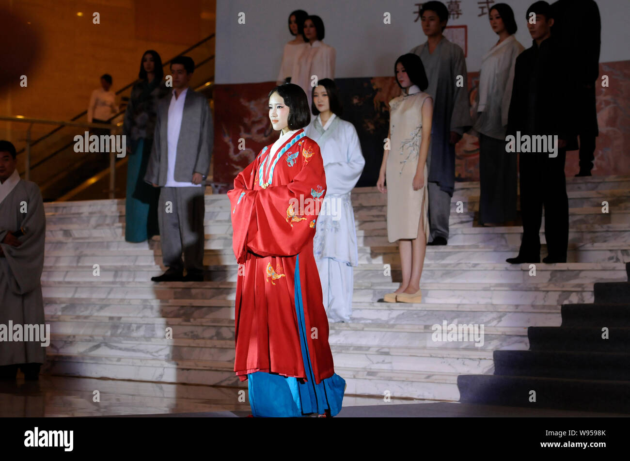 Models display Chinese-style clothes during a fashion show at the ...