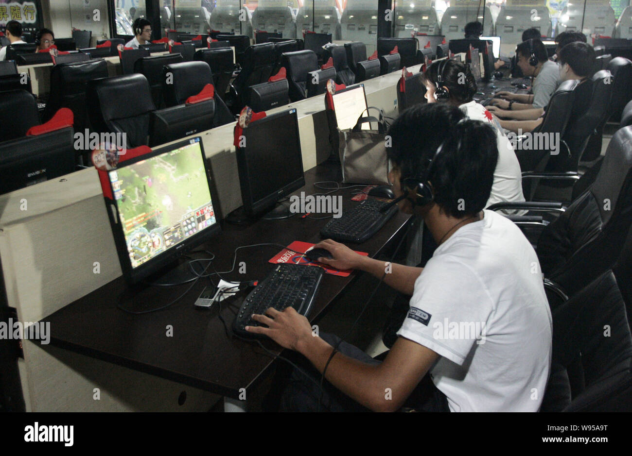--File--Chinese netizens are seen at an Internet cafe in Beijing, China ...