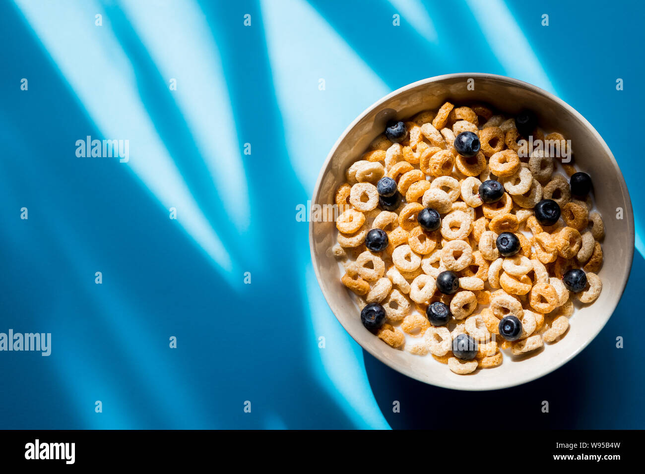 Corn flakes fruit splash of milk hi-res stock photography and images ...