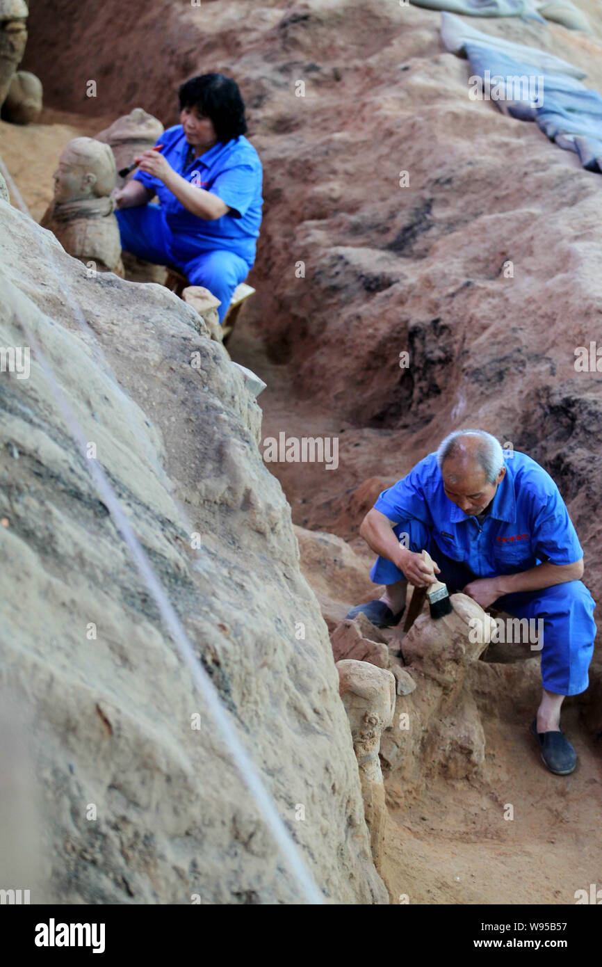 Chinese archaeologists excavate terracotta warriors in the No.1 Pit at ...