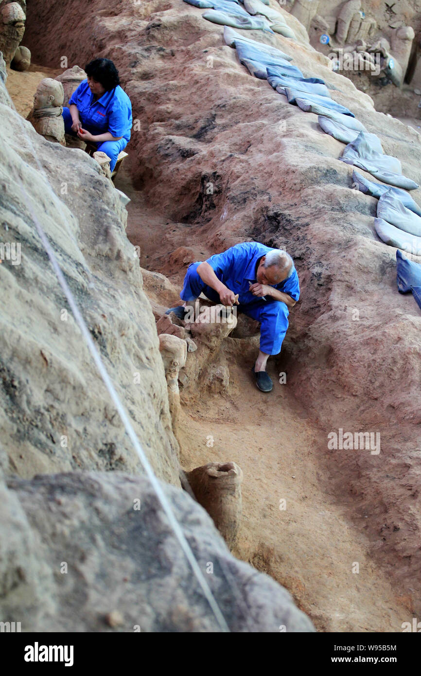 Chinese archaeologists excavate terracotta warriors in the No.1 Pit at ...