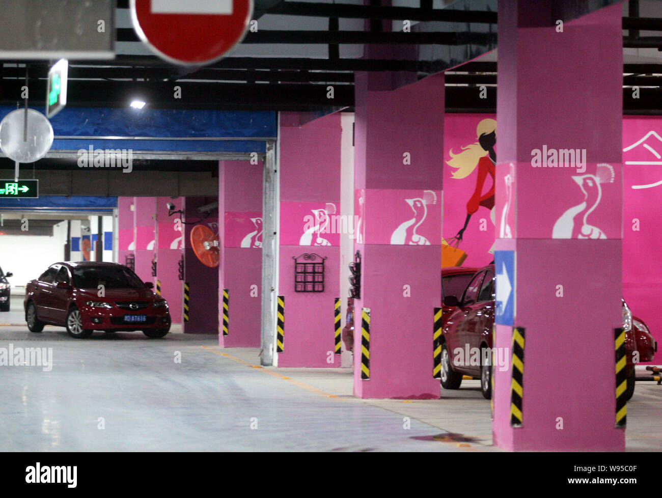 The ladies parking spaces marked in pink are pictured in the ...