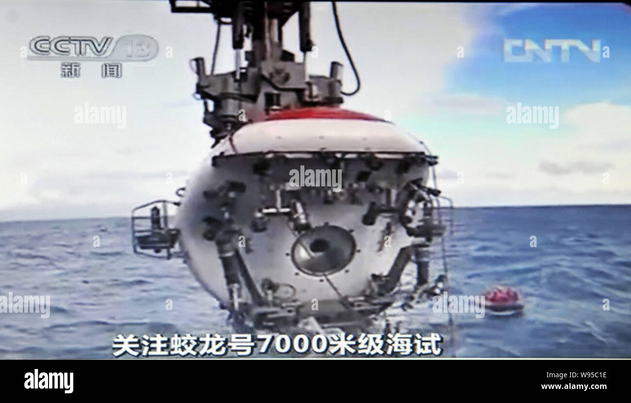 In this TV grab, the Jiaolong deep-sea submersible is being unloaded ...