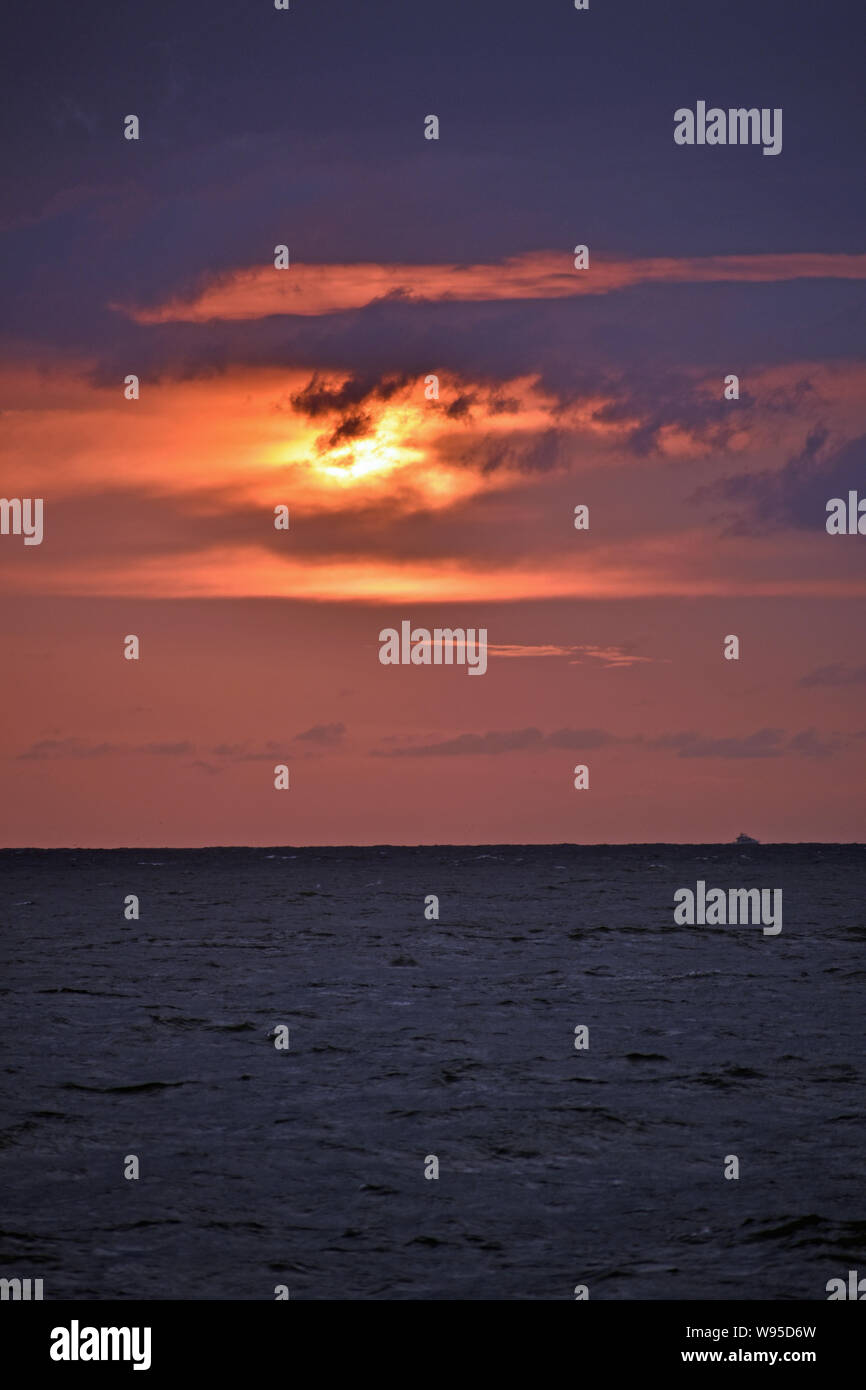 Red Sunset at the Beach Stock Photo - Alamy