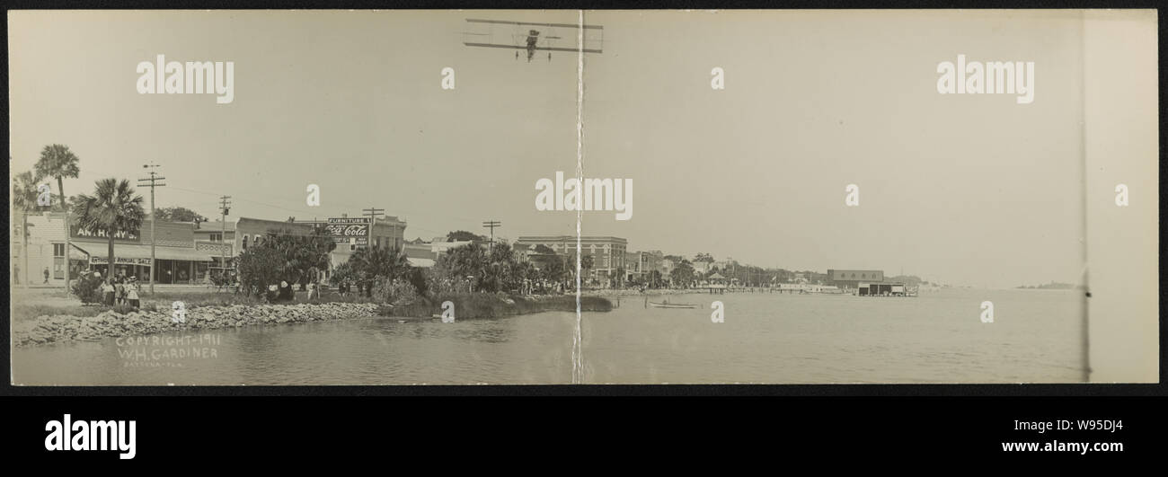 Airplane flying over water, Daytona, Florida Stock Photo - Alamy