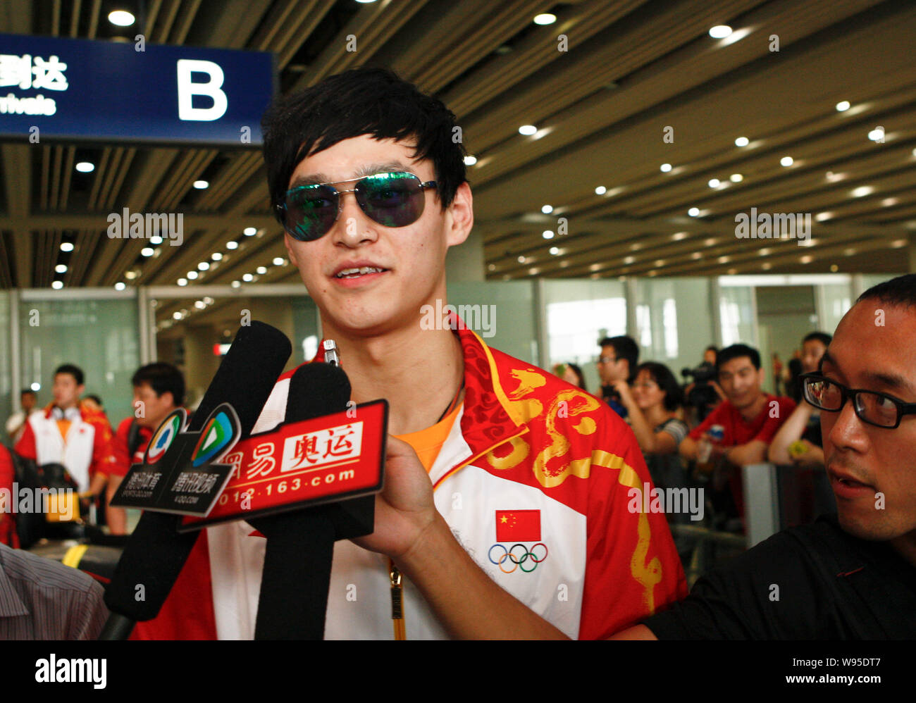 Chinese Olympic swimming champion Sun Yang is interviewed at the ...