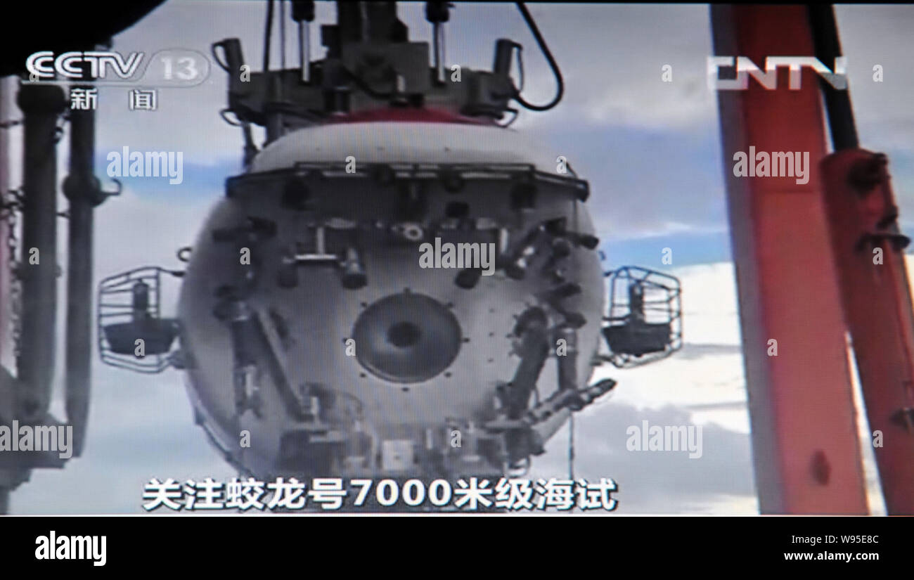In this TV grab, the Jiaolong deep-sea submersible is being unloaded ...