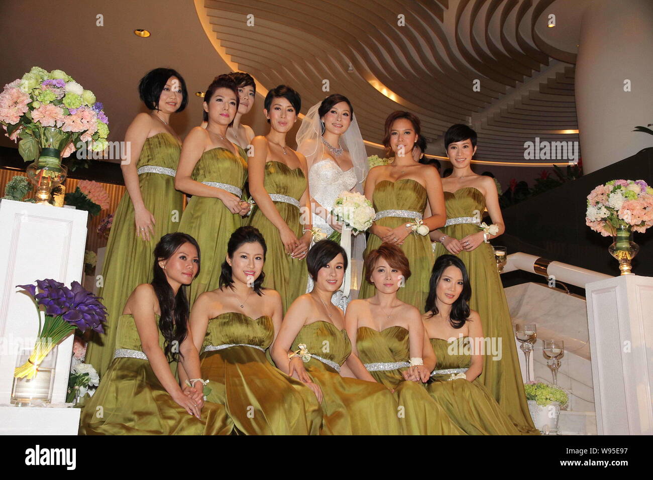 Pregnant Hong Kong actress Angela Tong, center, poses with her ...