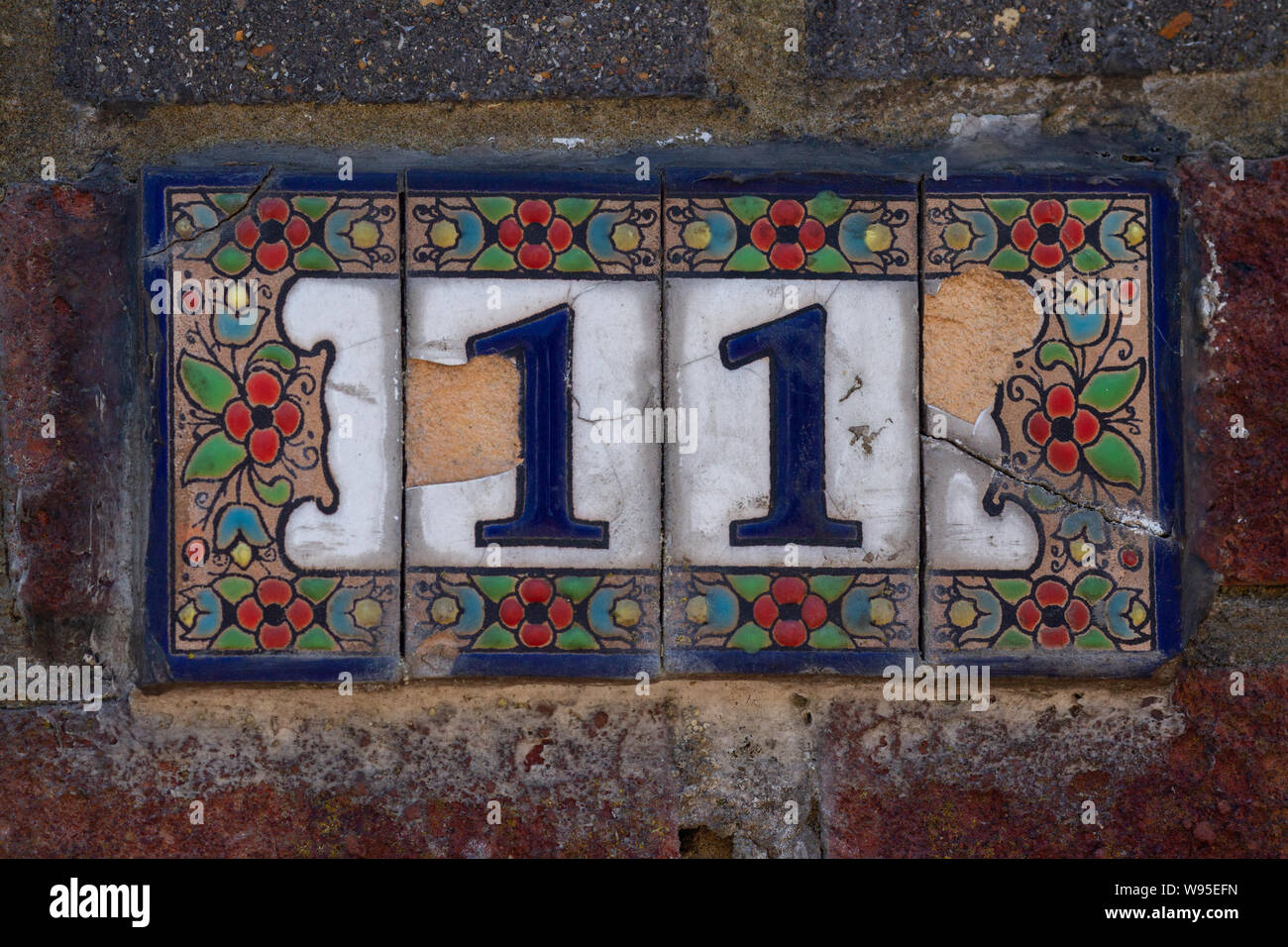 House number 11 with the eleven worked in colorful tiles Stock Photo ...