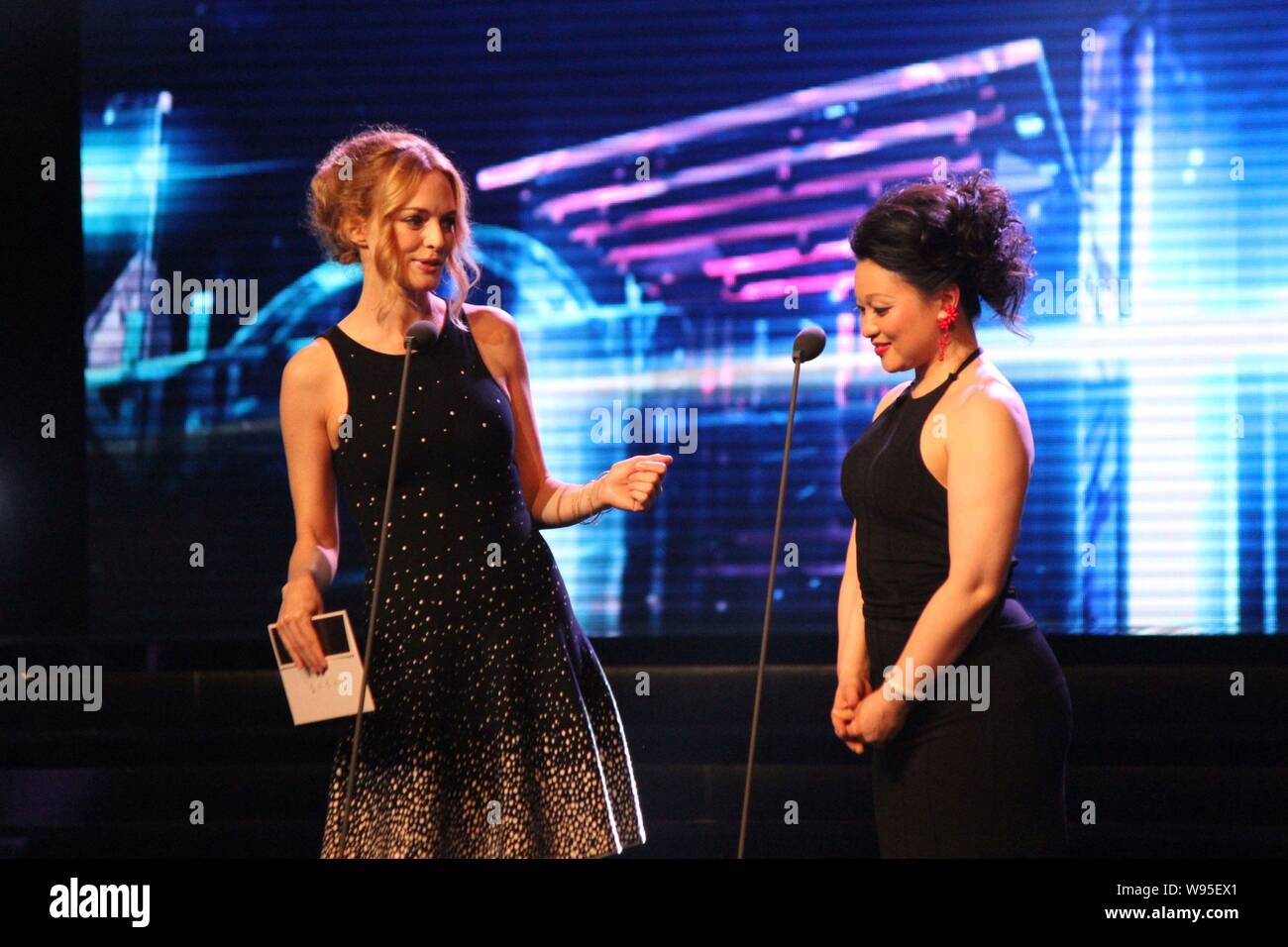 American actress Heather Graham (L) and Chinese singer Huang Ying are ...