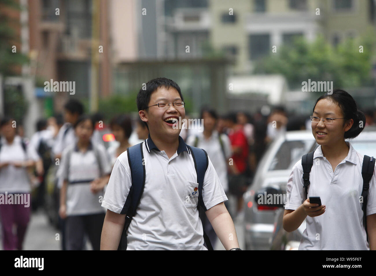 --File--Chinese junior high school students leave an exam site after ...