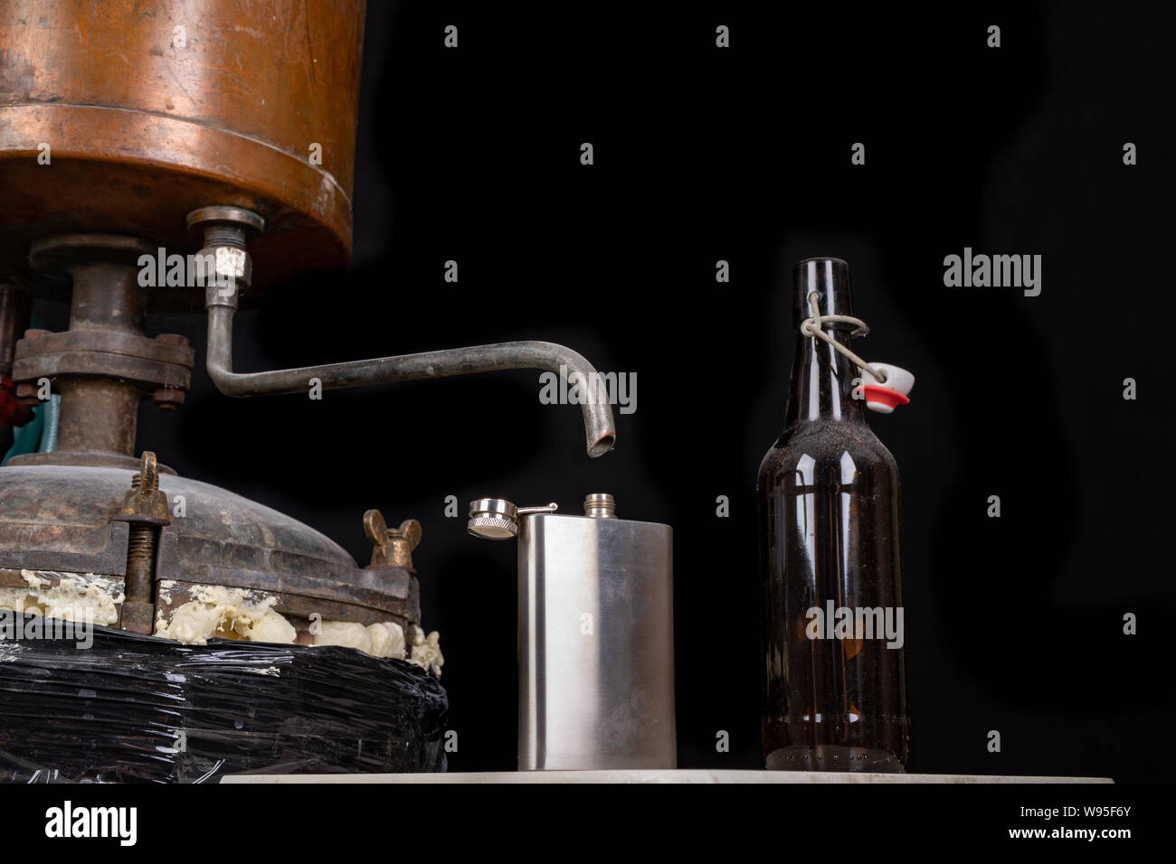 A metal hip at the alcohol distillation machine. Accessories for people ...