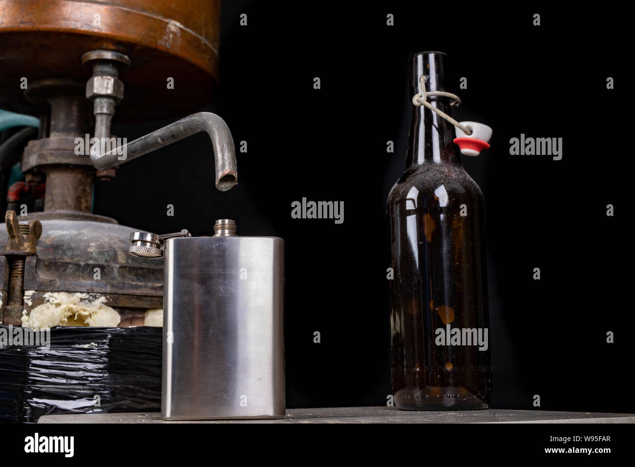 A metal hip at the alcohol distillation machine. Accessories for people ...
